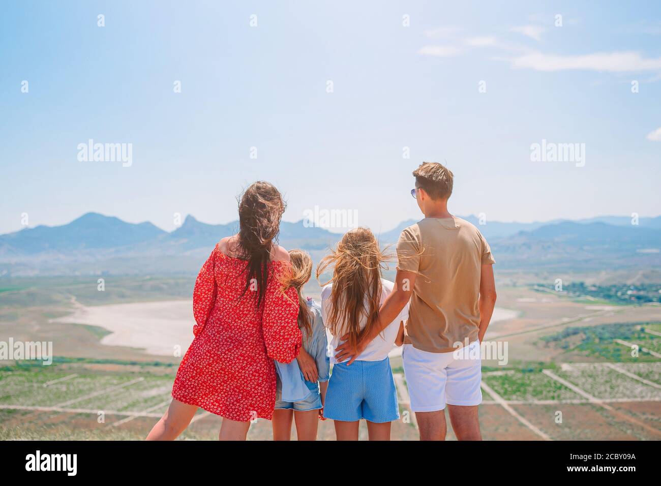 Happy family on vacation in the mountains Stock Photo - Alamy