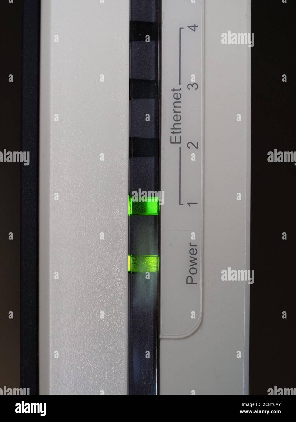 Ethernet and power green led on a modem router Stock Photo - Alamy