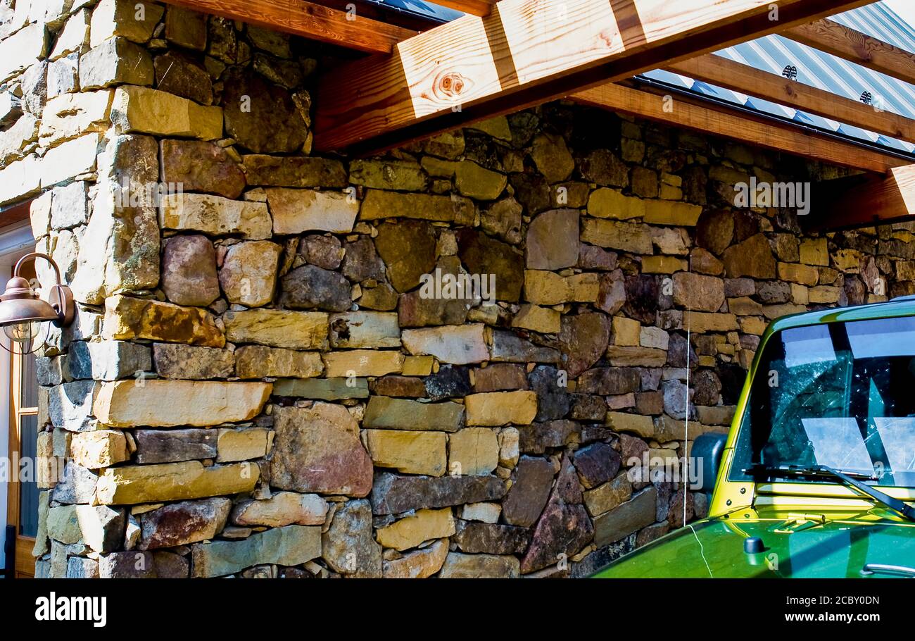 Stone wall garage Stock Photo - Alamy