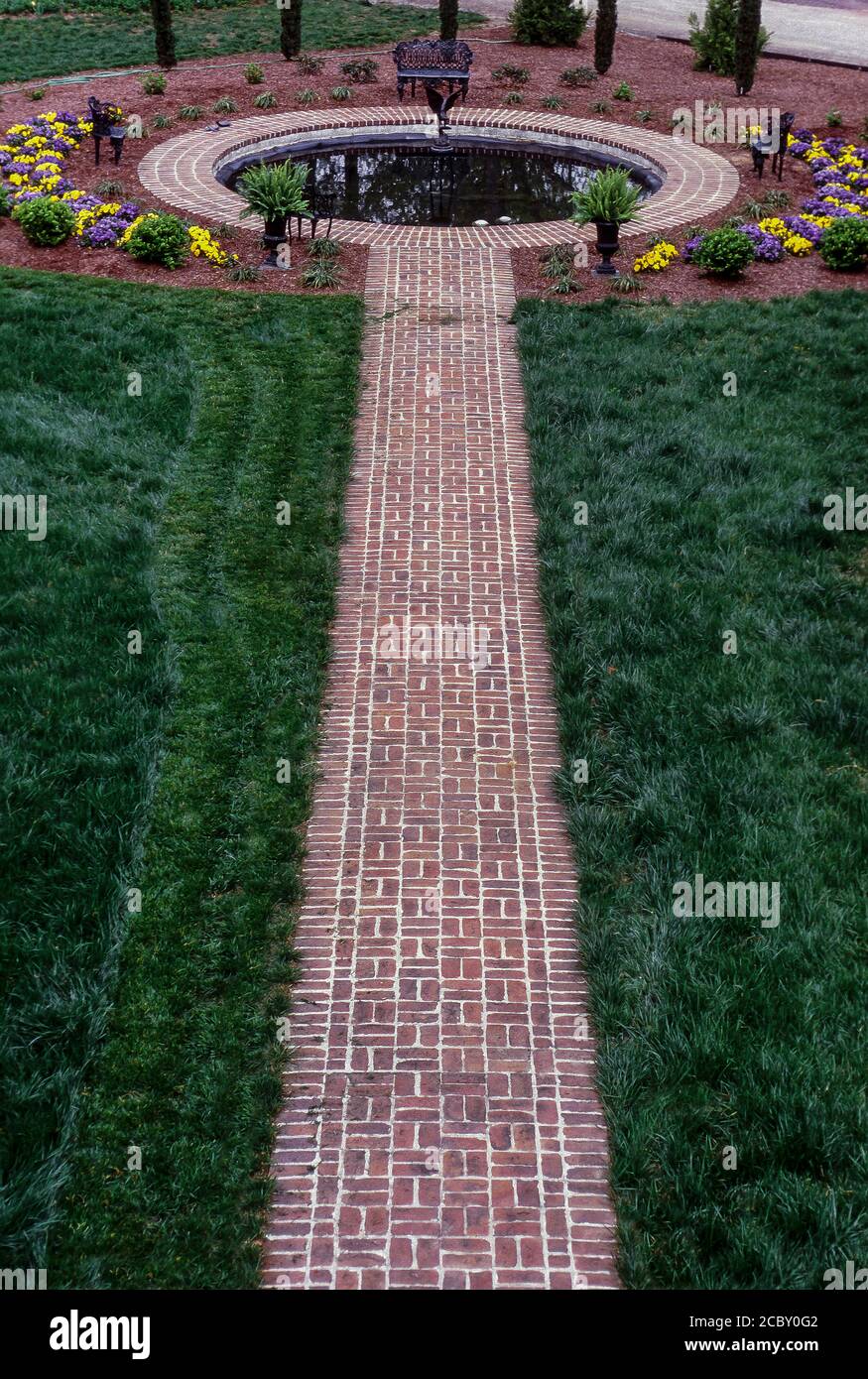 Landscape Design -Round Pond, Brick Walkway Stock Photo - Alamy