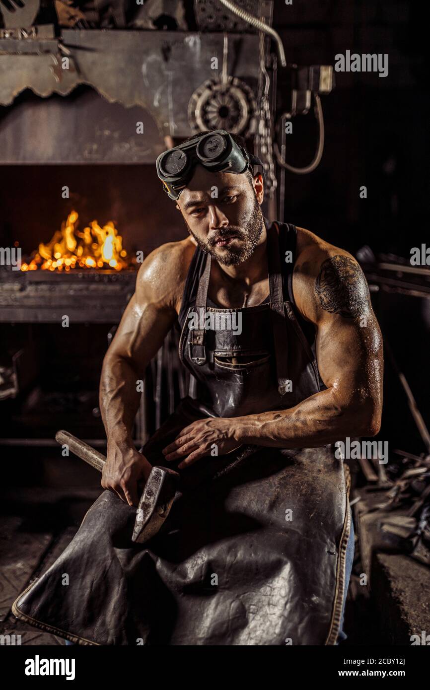 Muscle man apron hi-res stock photography and images - Alamy