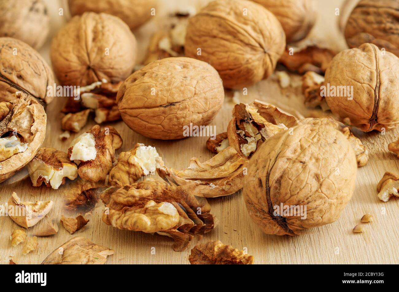 ripe walnuts, in shell and cracked, fruit, seeds, isolated, wrinkled ...