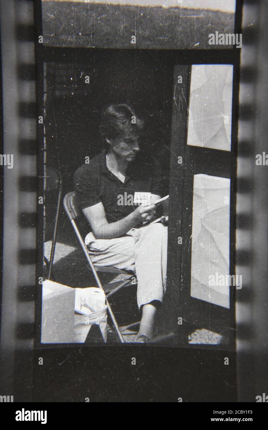 Fine 1970s vintage black and white photography of an artist manning ...