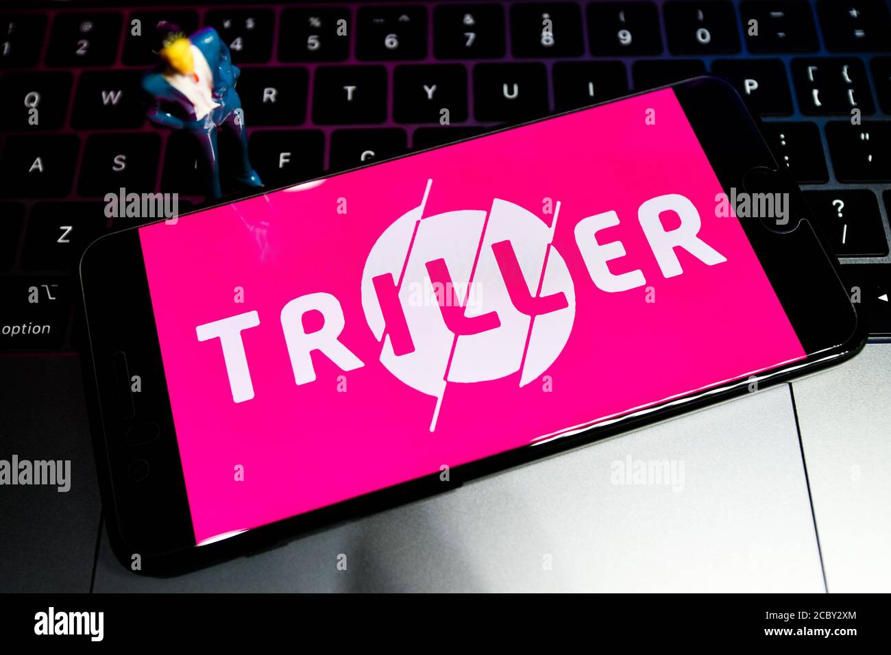 In this photo illustration the Triller logo is seen displayed on a ...