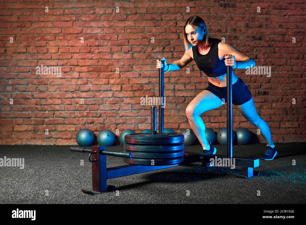 Pushing against wall hi-res stock photography and images - Alamy