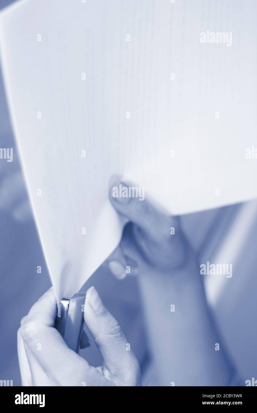 Staple gun woman hi-res stock photography and images - Alamy