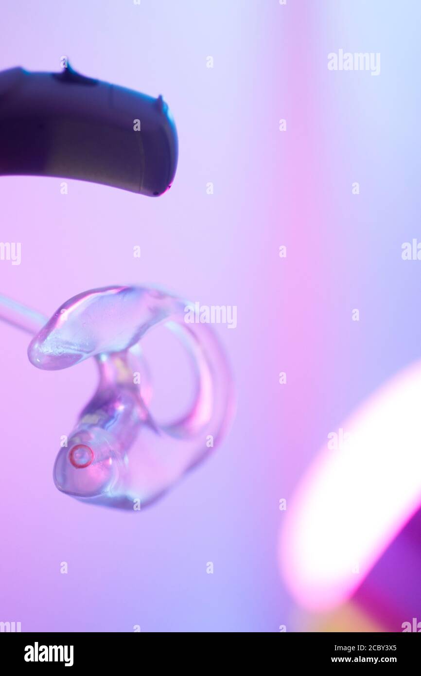 Modern digital hearing aid for deafness and deaf people Stock Photo - Alamy