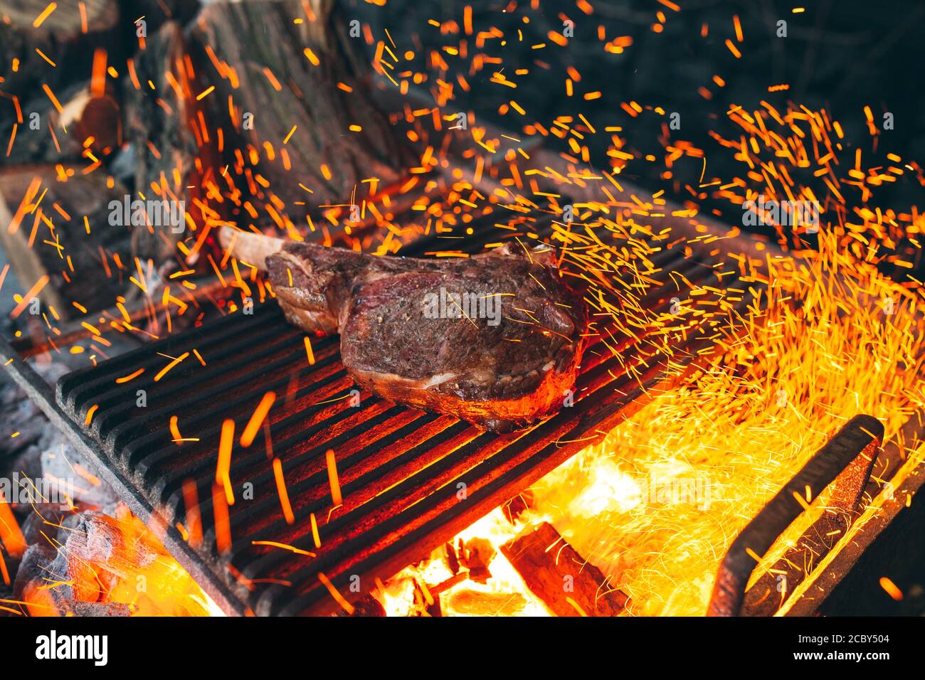 Beef steak is cooked on fire. Beef Rib BBQ Stock Photo - Alamy