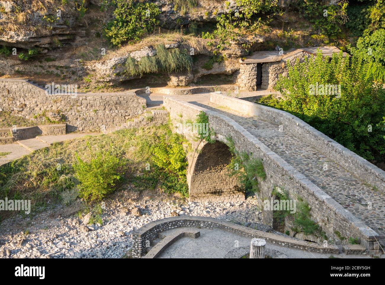 The Old Bridge,during the dry season of August.Next to the river within ...