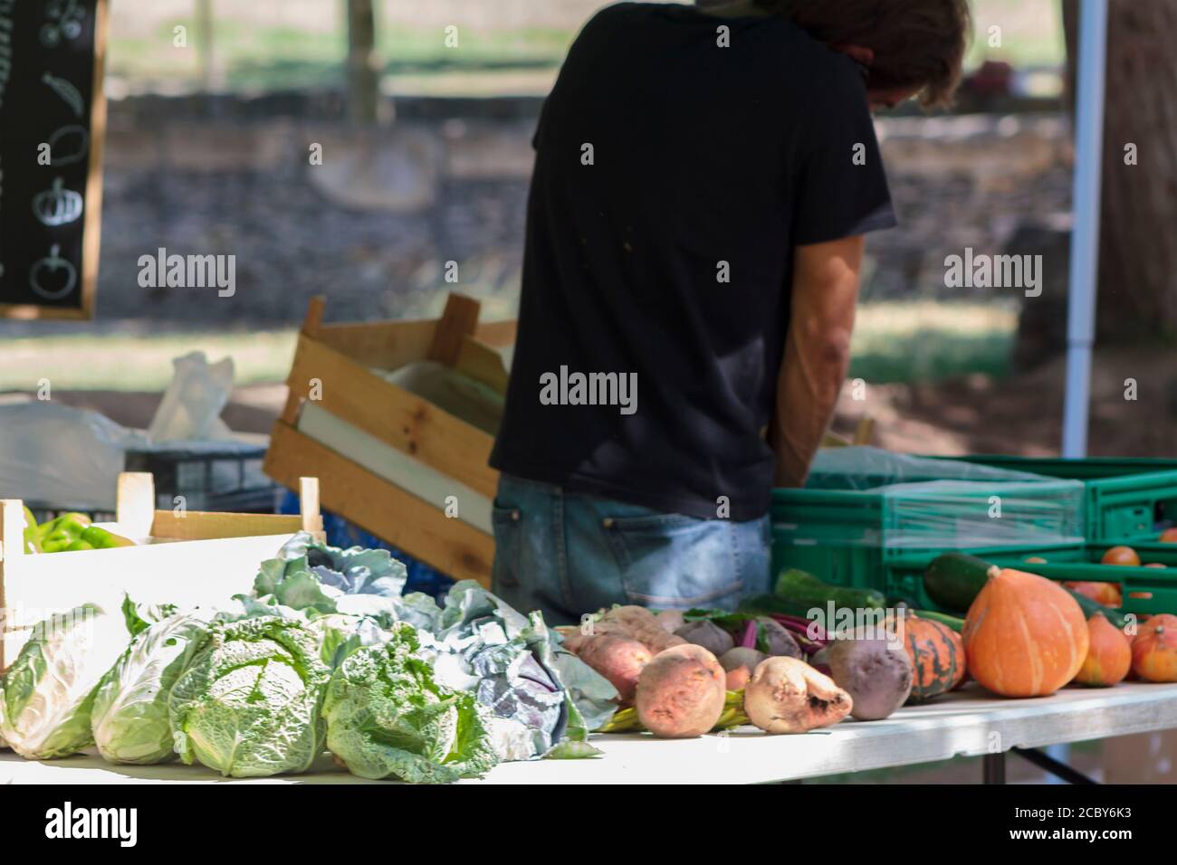 Vegetables on stall at outdoor market Stock Photo - Alamy