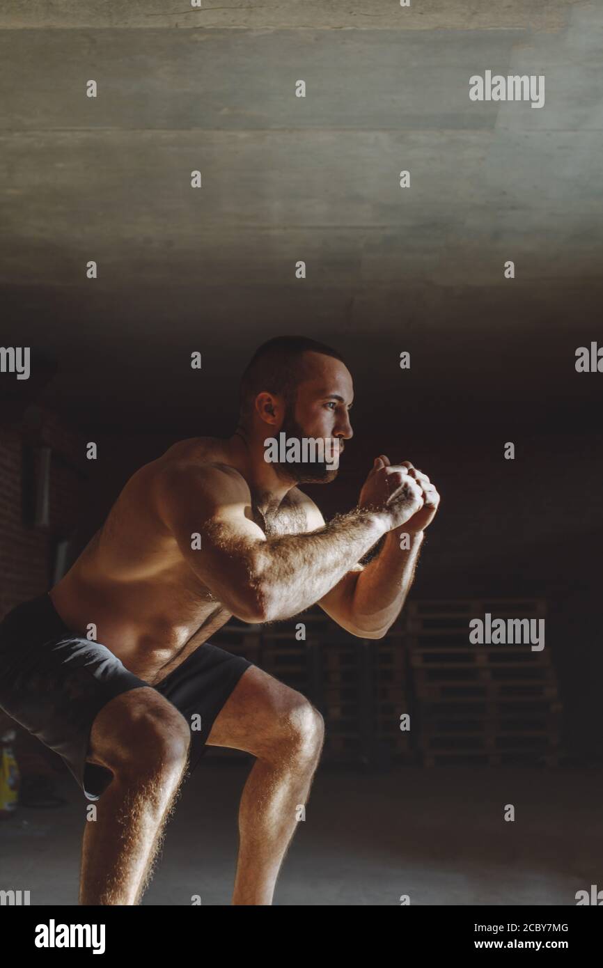 Box jump plyo exercise - young caucasian man doing functional workout ...