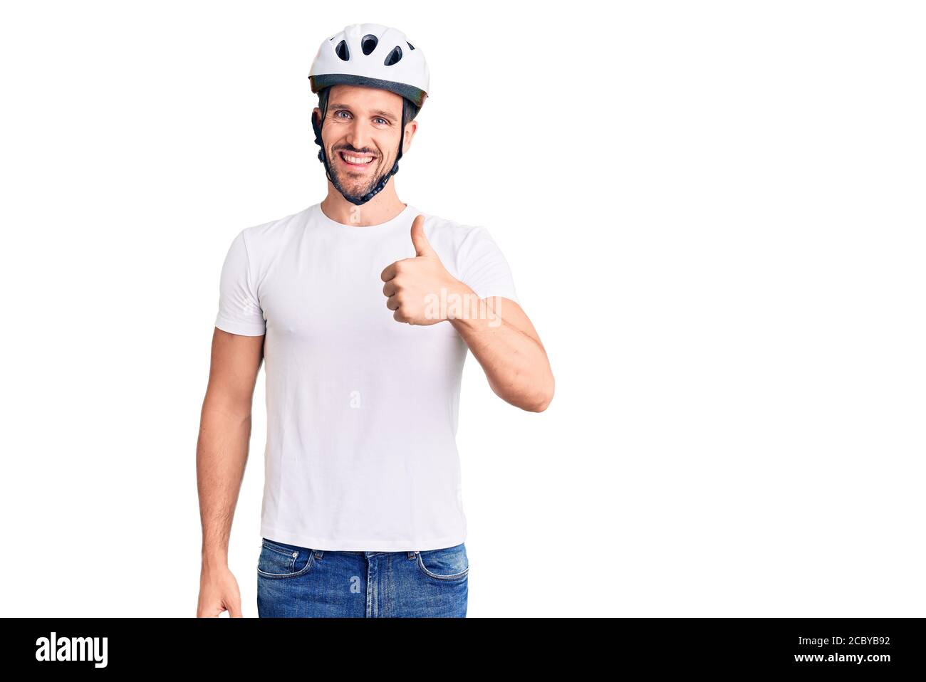 Young Handsome Man Wearing Bike Helmet Doing Happy Thumbs Up Gesture
