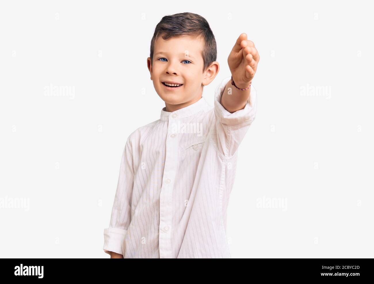 Cute blond kid wearing elegant shirt smiling friendly offering ...