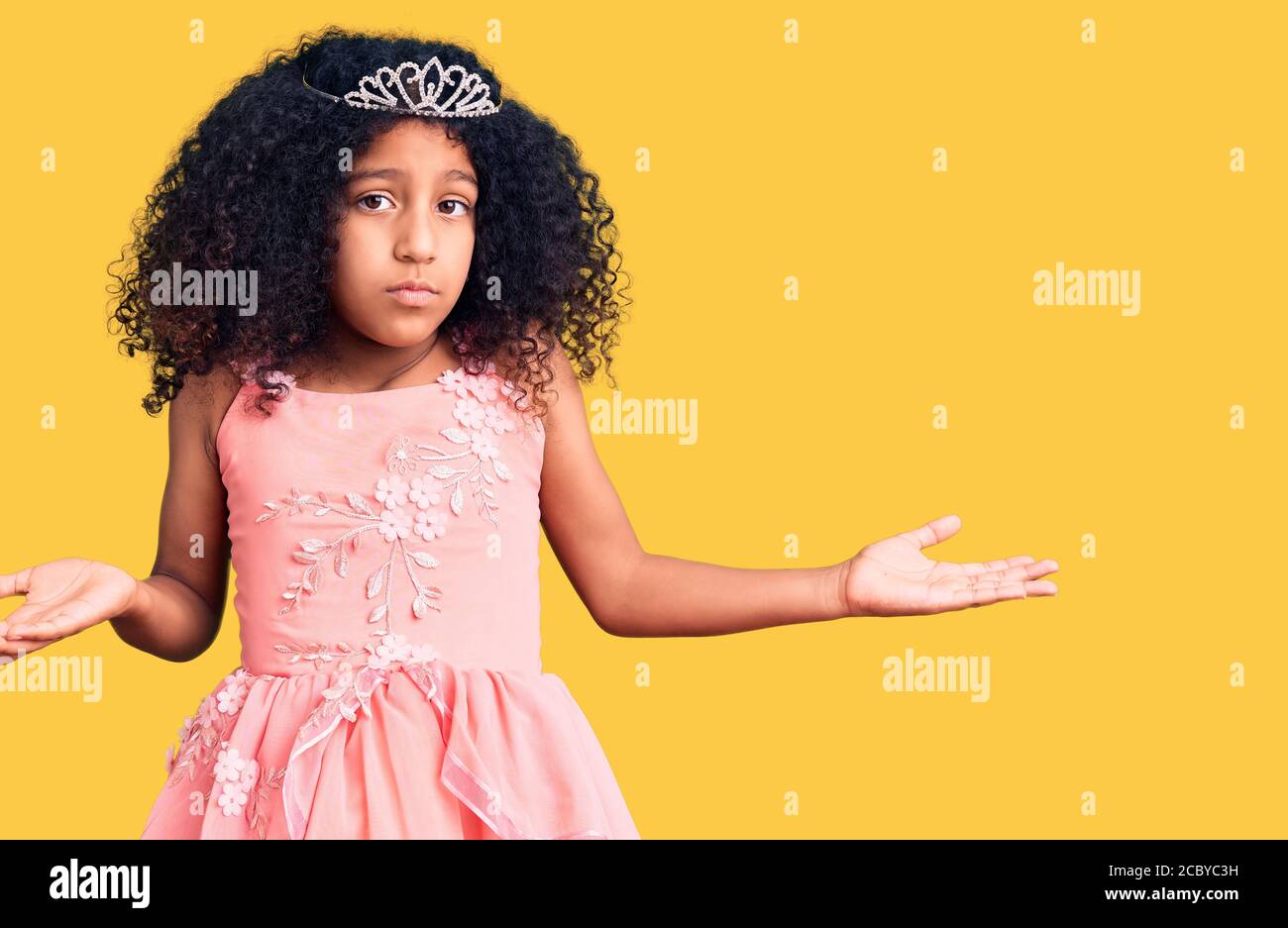 African american child with curly hair wearing princess crown clueless ...