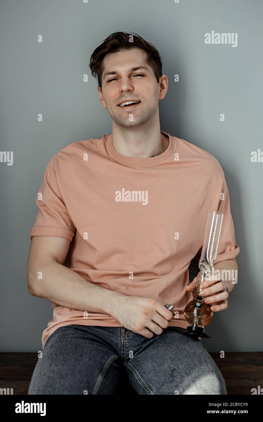 young caucasian man enjoy using drugs at home, he has problems with ...