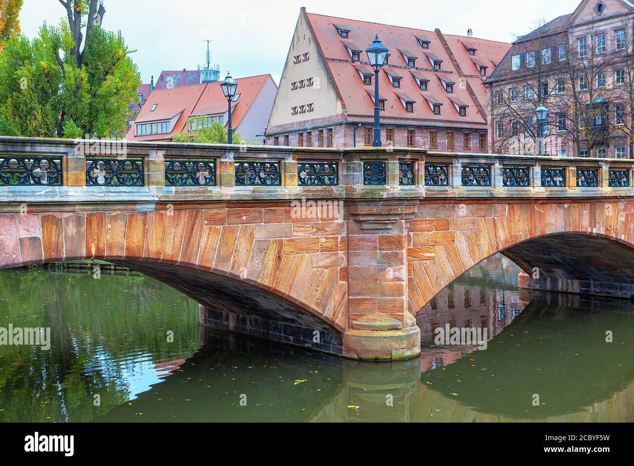 arched medieval bridge over the Pegnitz river in Nuremberg Stock Photo ...