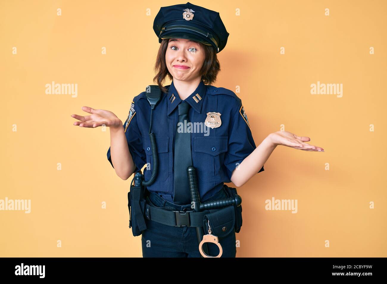 Shrugging cop hi-res stock photography and images - Alamy