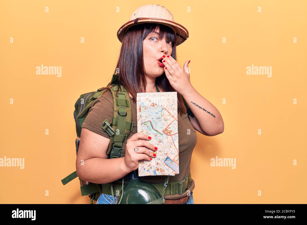 Surprised explorer holding map hi-res stock photography and images - Alamy