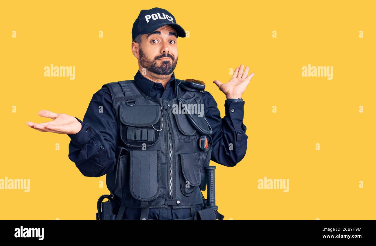 Shrugging cop hi-res stock photography and images - Alamy