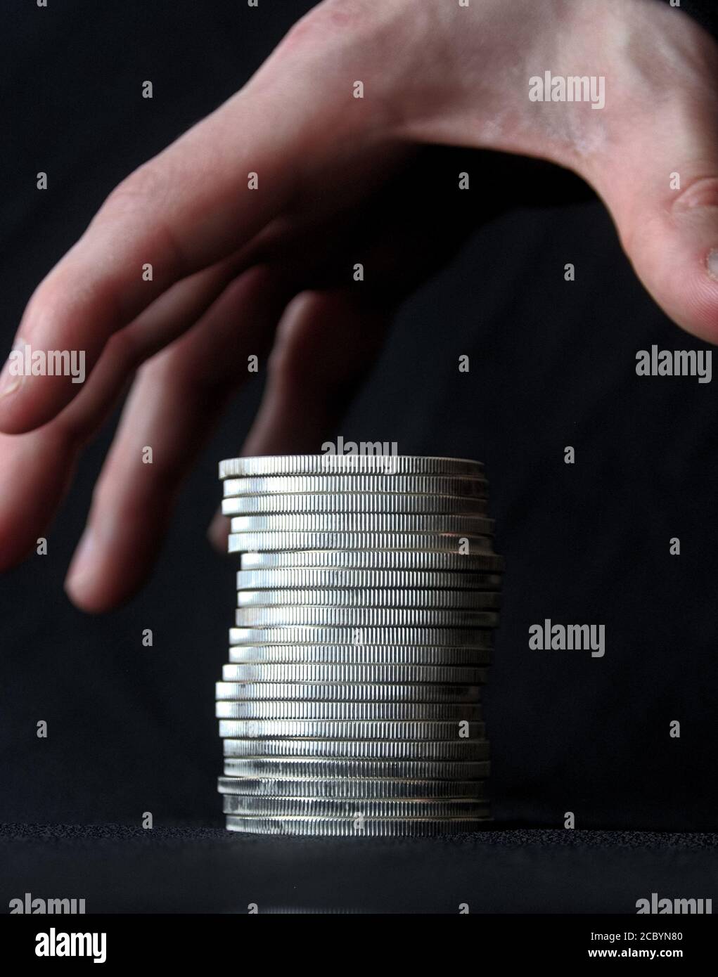 Hand grabbing money hi-res stock photography and images - Alamy