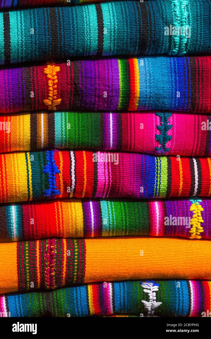Colorful patterns in Mayan weavings hand-woven on backstrap looms for ...