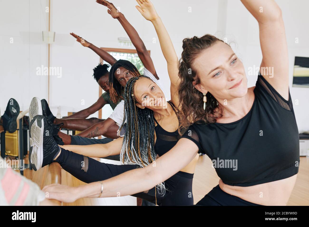 Training on ballet barre Stock Photo - Alamy