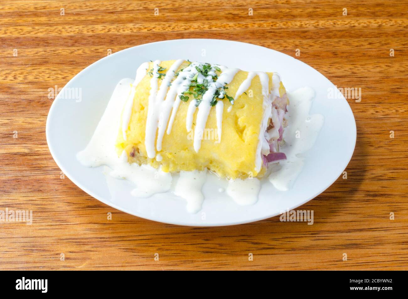Peruvian layered potato dish. cause stuffed Stock Photo - Alamy