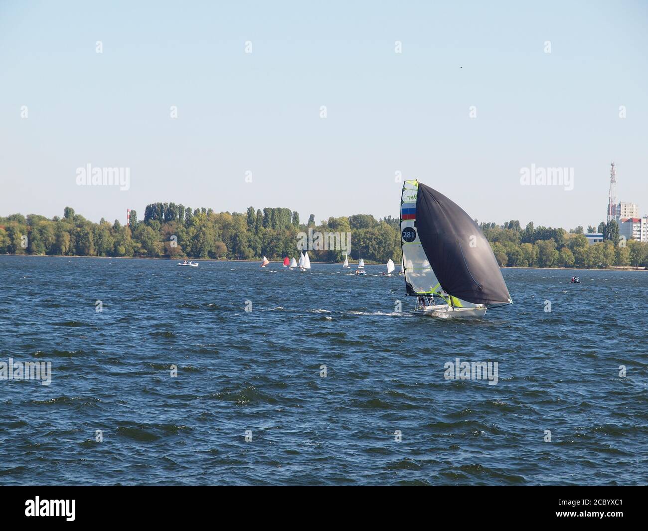 Single yacht sailing Stock Photo - Alamy