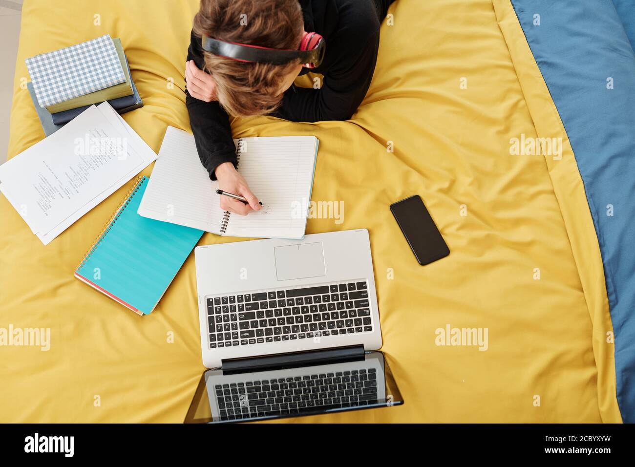 Student doing homework Stock Photo - Alamy