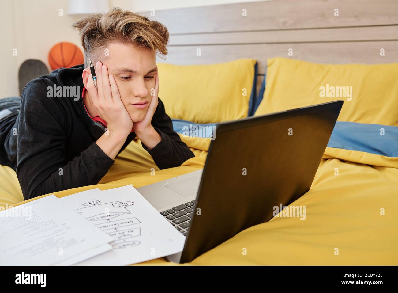 Student attending online class Stock Photo - Alamy