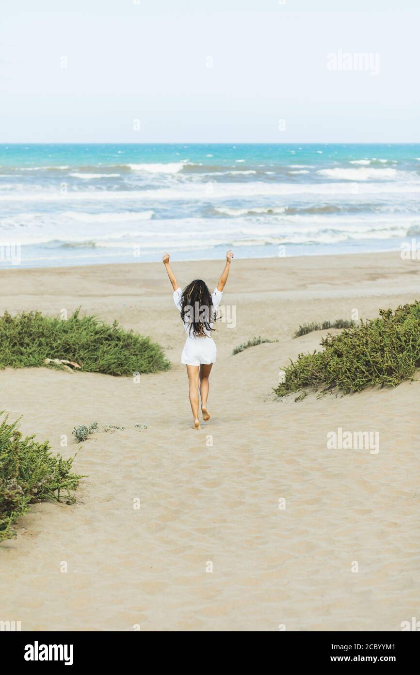 Woman Running At The Beach High Resolution Stock Photography and Images ...