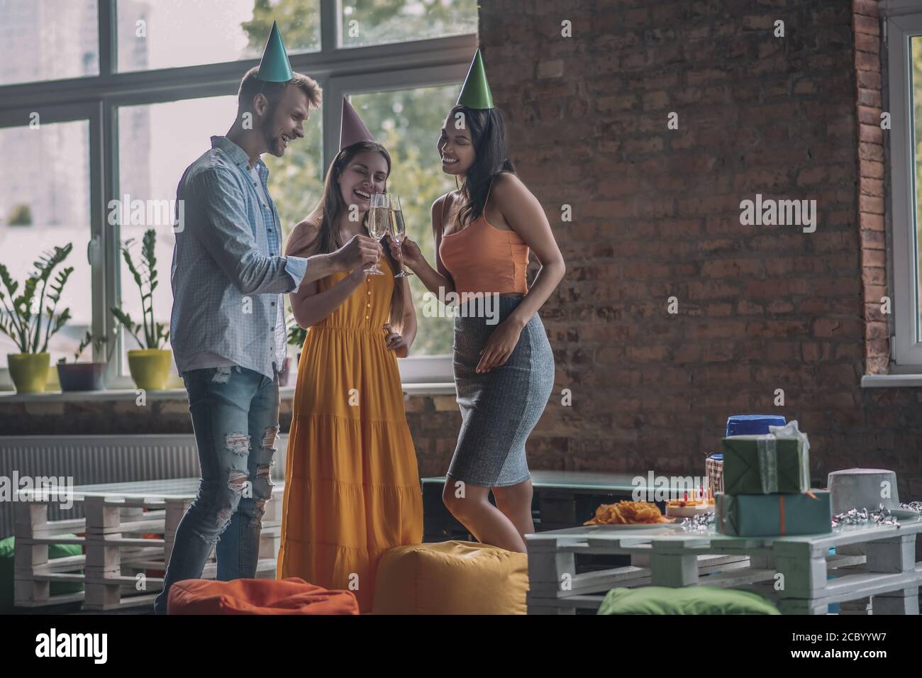 Group of friends celebrating a birthday party Stock Photo - Alamy