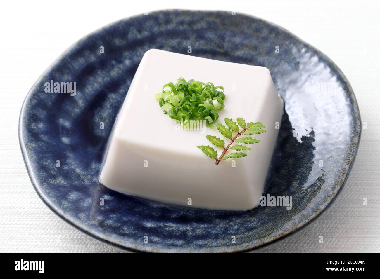 Japanese food, Japanese soft cold tofu in a bowl on white background ...