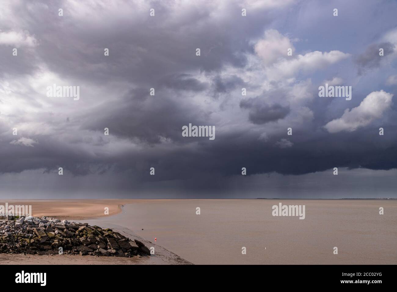 Clouds and rain at Greenfield on the North Wales coast Stock Photo - Alamy