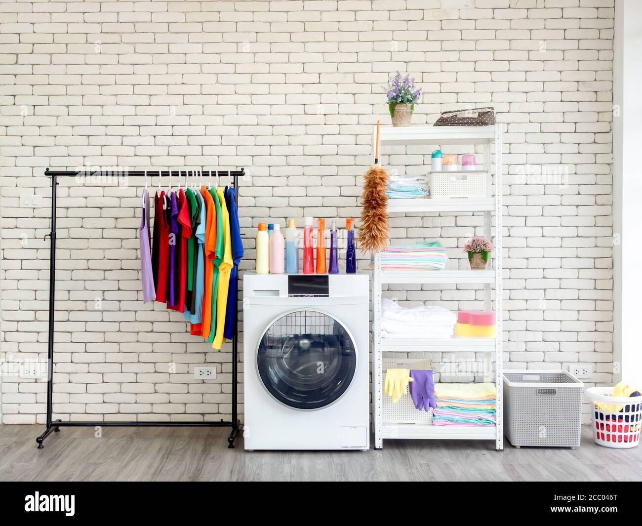 Laundry room interior. Utility room with washing machine, cleaning ...