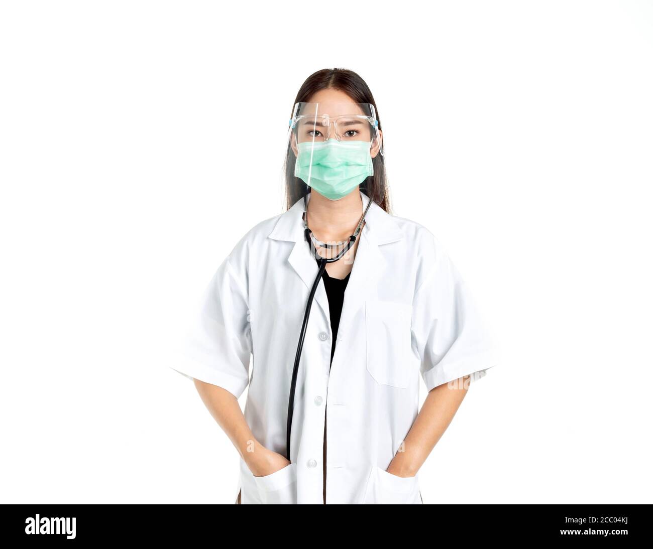 Asian woman doctor wearing green medical face mask, face shield and ...