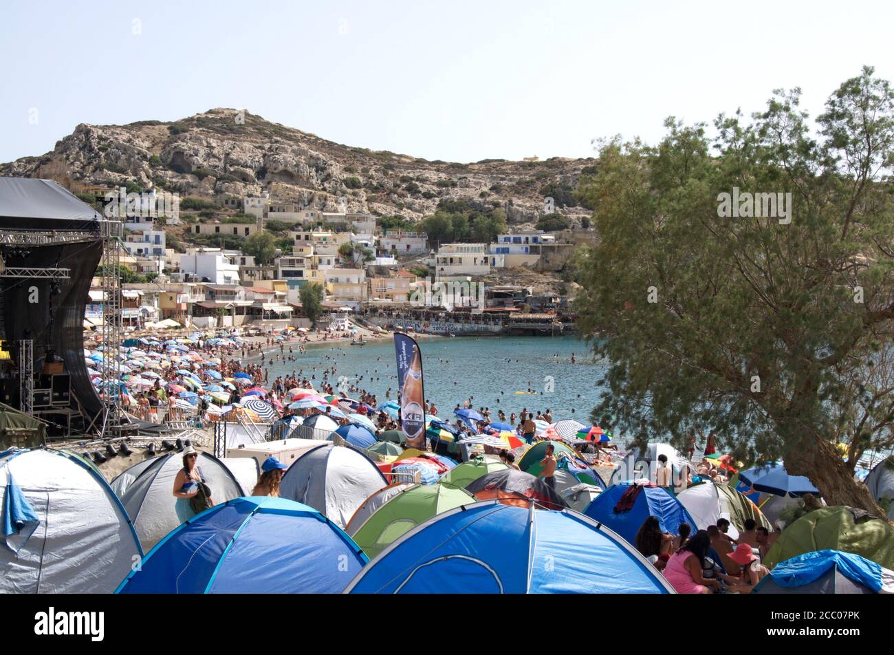 Traditional hippie festival on the extraordinary beach of Matala in ...