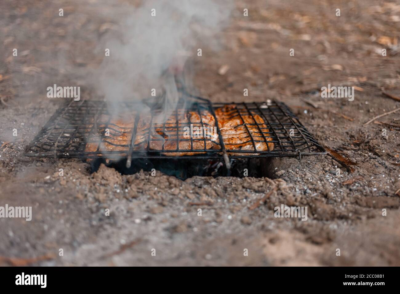 Pit roasted meat hi-res stock photography and images - Alamy