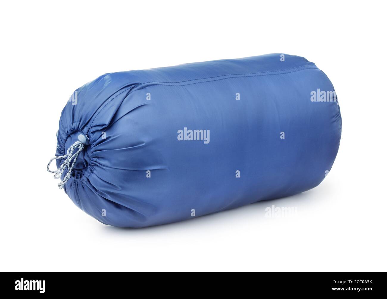 Blue packed sleeping bag isolated on white Stock Photo - Alamy