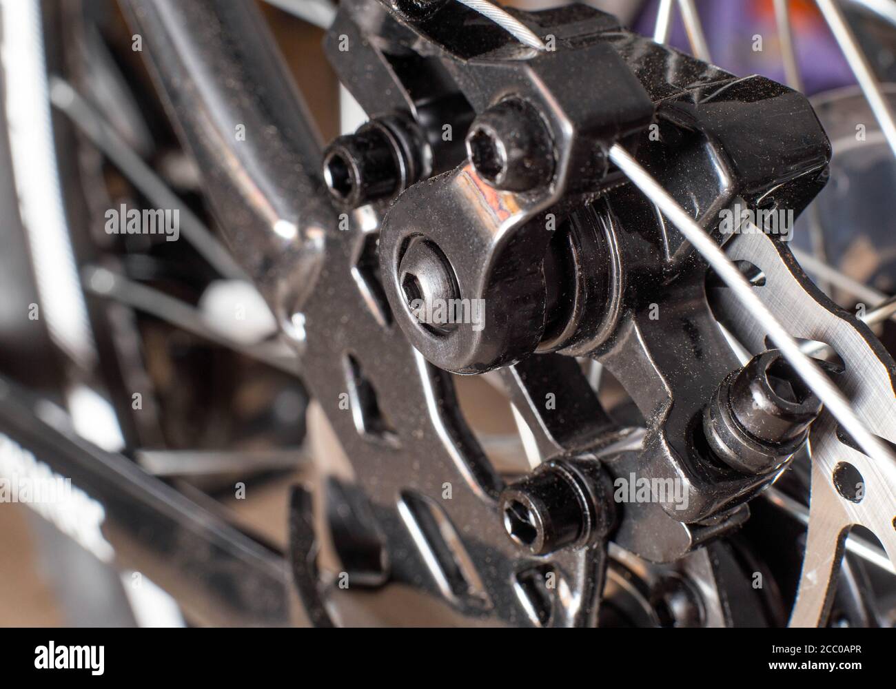 Brake system of a caliper and a metal brake disc on a bicycle ...
