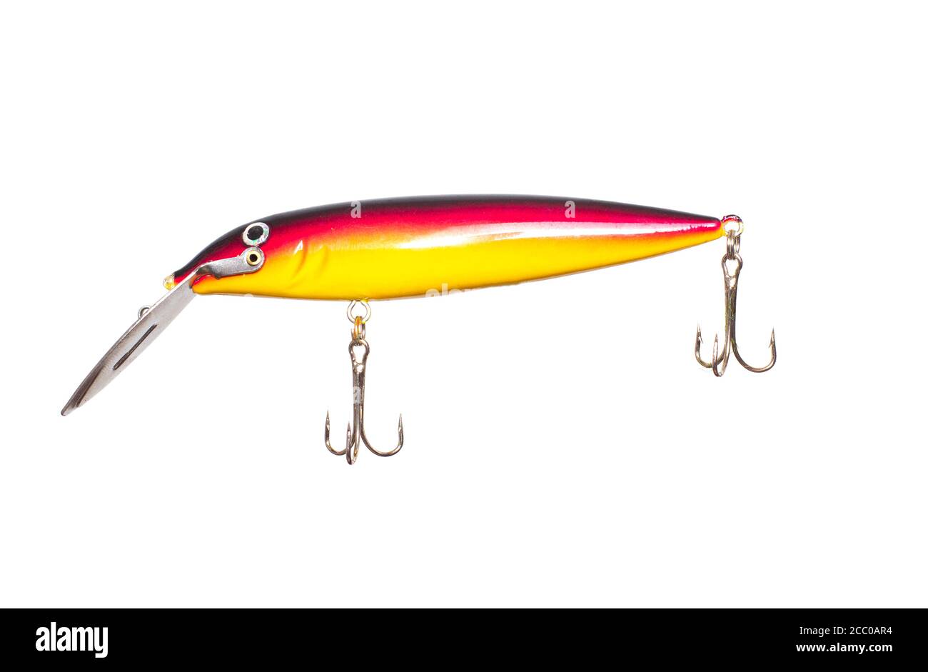 Orange red tinted wobbler for fishing, fishing tool on white background ...
