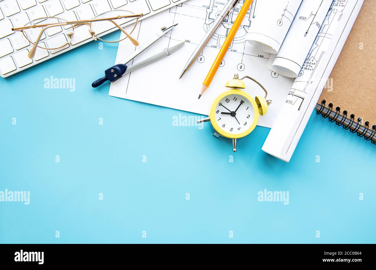 Architect workplace top view. Architectural project, blueprints ...