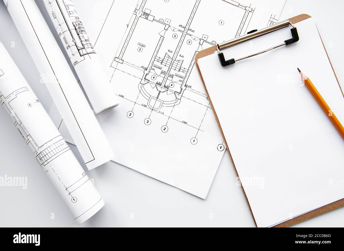 Architect workplace top view. Architectural project, blueprints ...