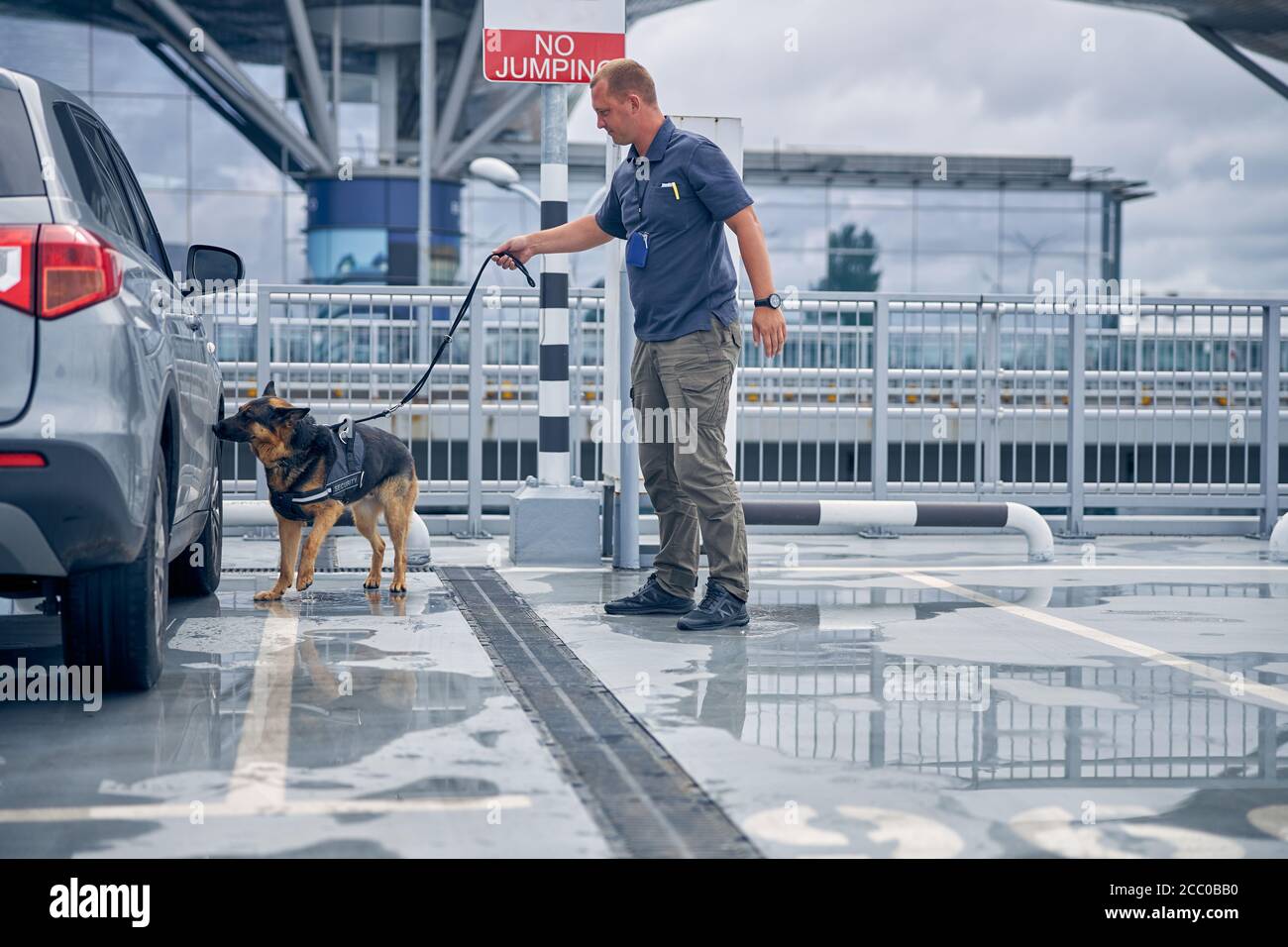 Male security officer checking hi-res stock photography and images - Alamy