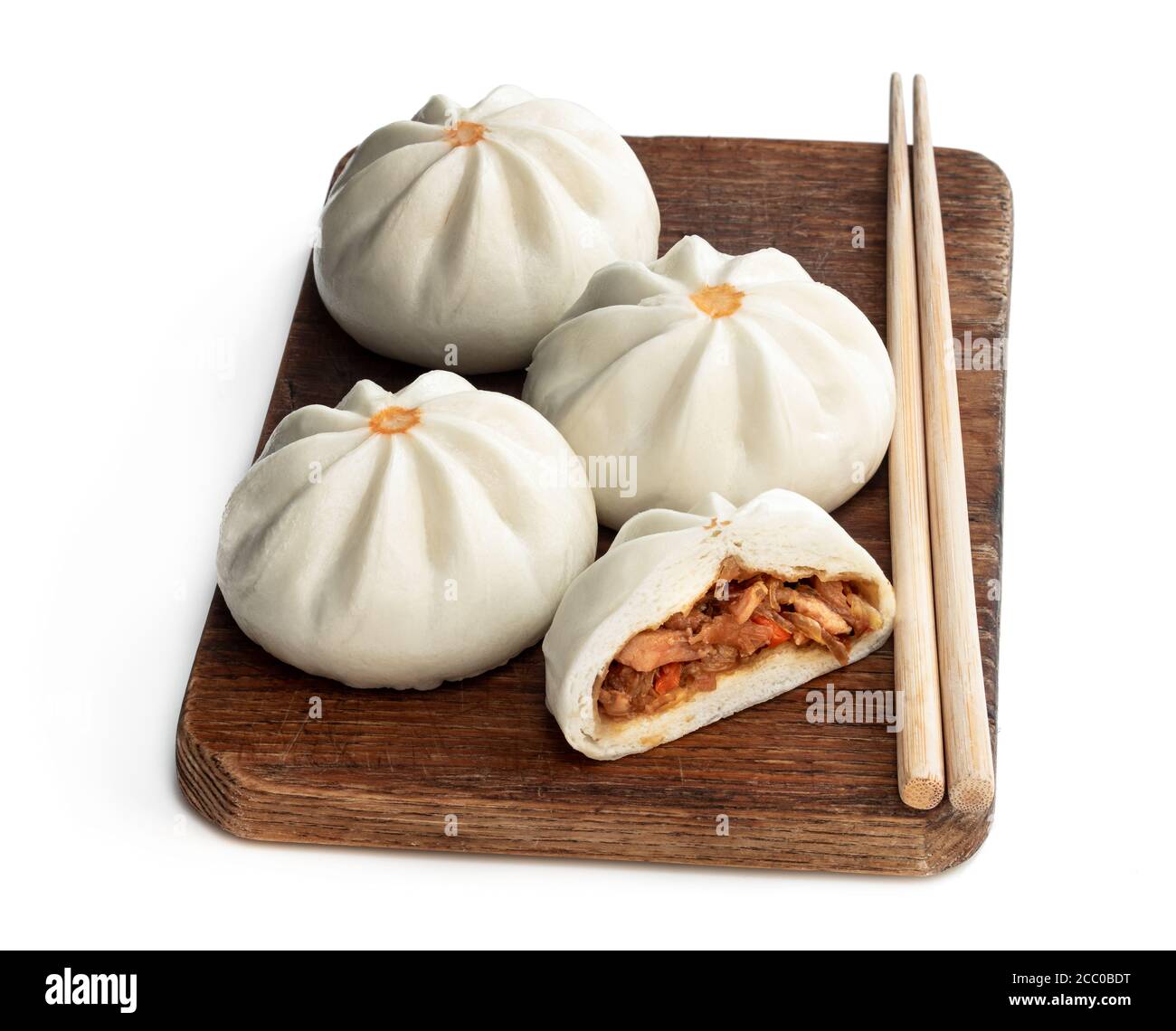 Steamed bao buns with delicious filling isolated on white Stock Photo ...