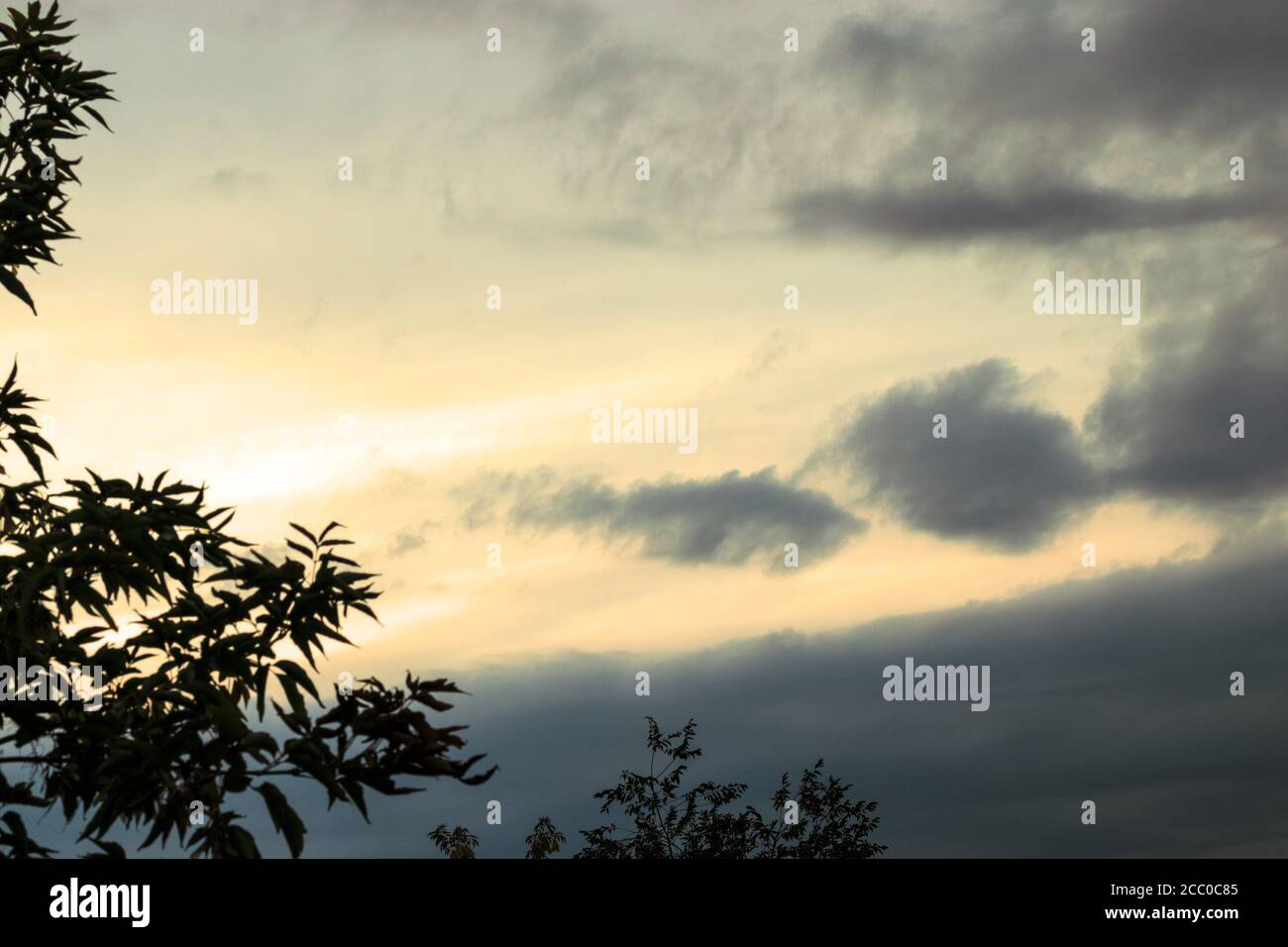 The evening sky is in the sunset. The photo was taken near the town of ...