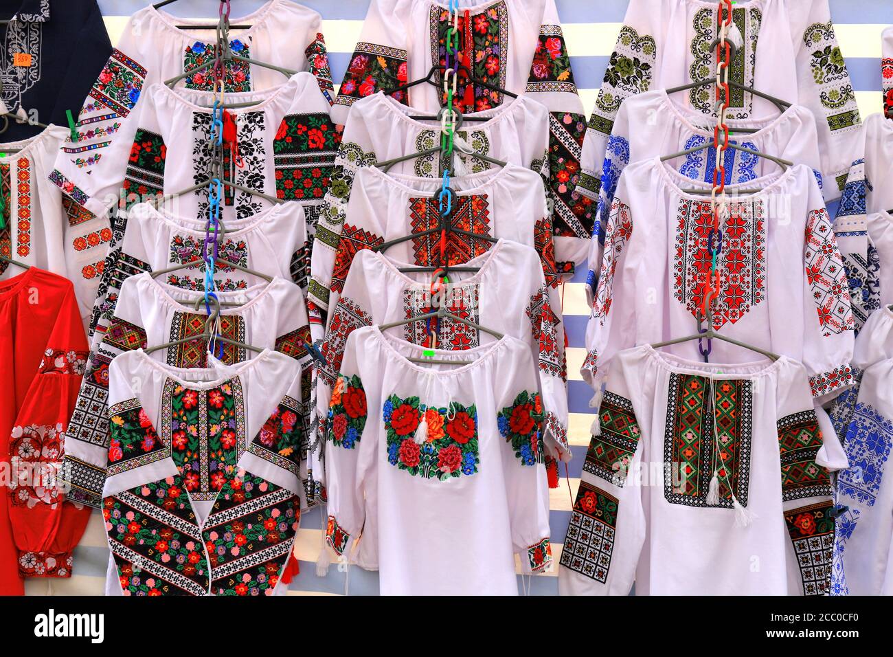 Beautiful Ukrainian ethnic embroidered shirts, vyshyvanka, hang at the ...