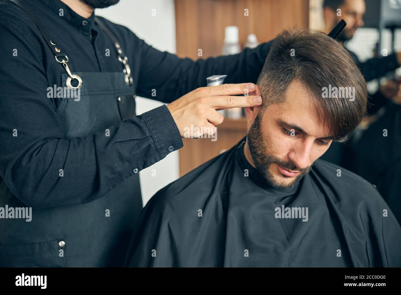 Barber and client interaction hi-res stock photography and images - Alamy