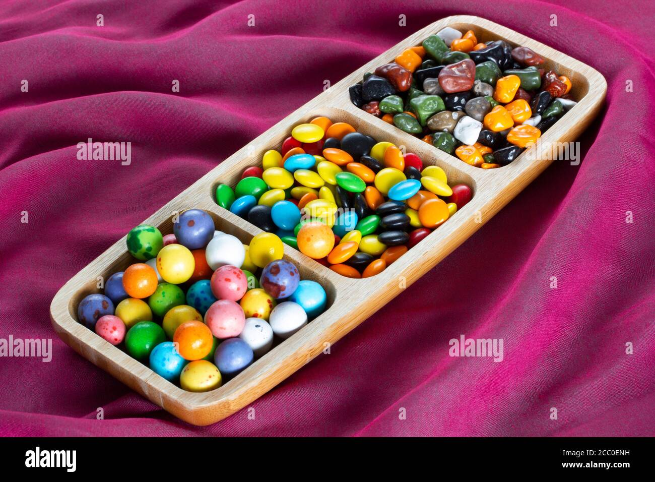 multicolor sugar coated chocolates background Stock Photo - Alamy