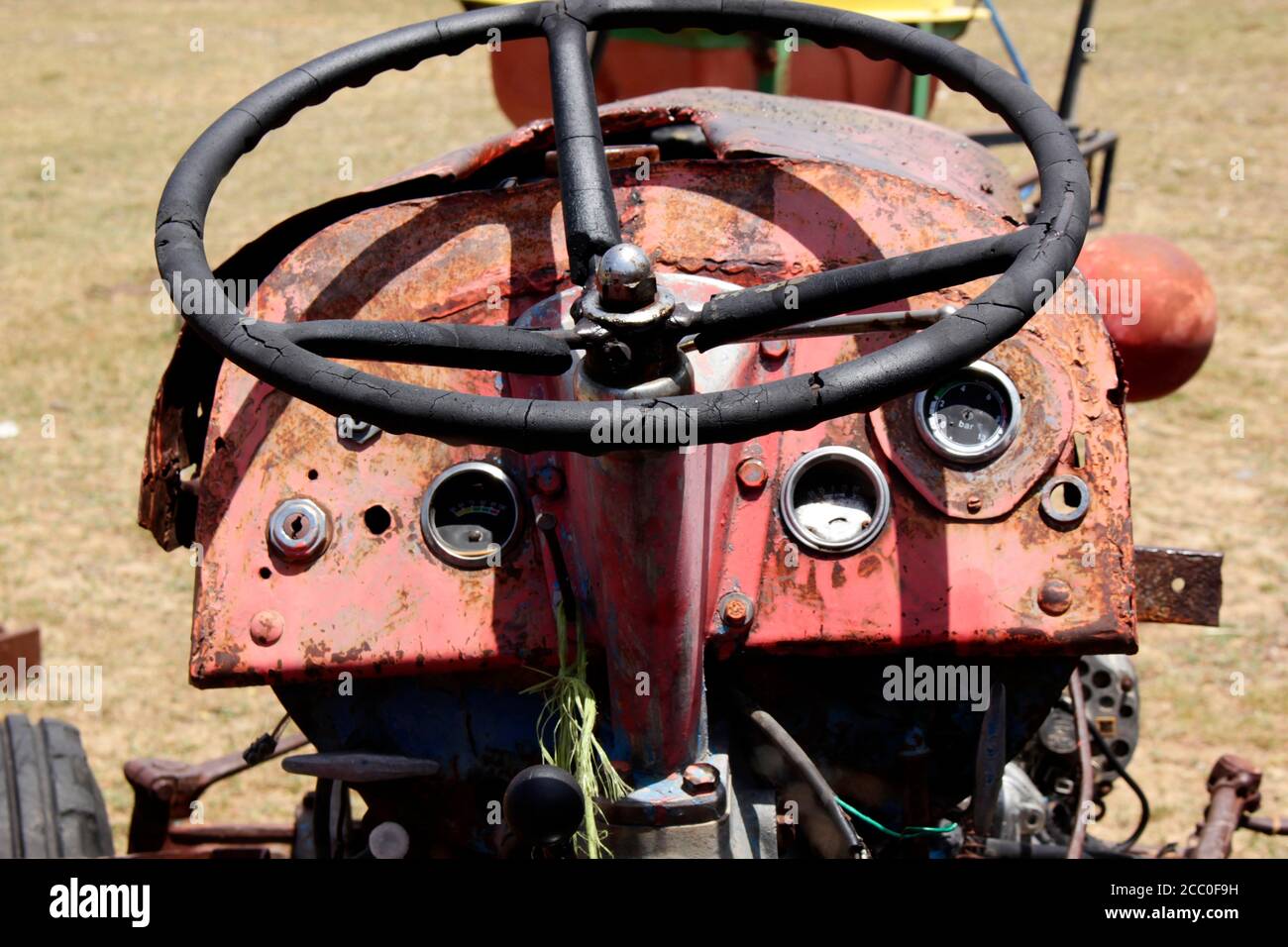 Old rusty tractor in junkyard hi-res stock photography and images - Alamy